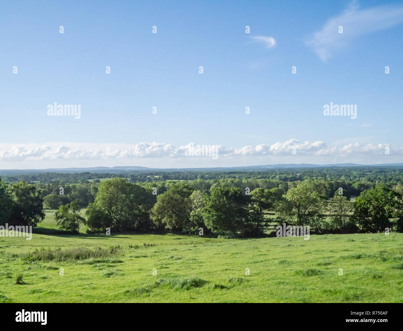 Simple view of Sussex countryside shot with beautiful clouds in a blue ...