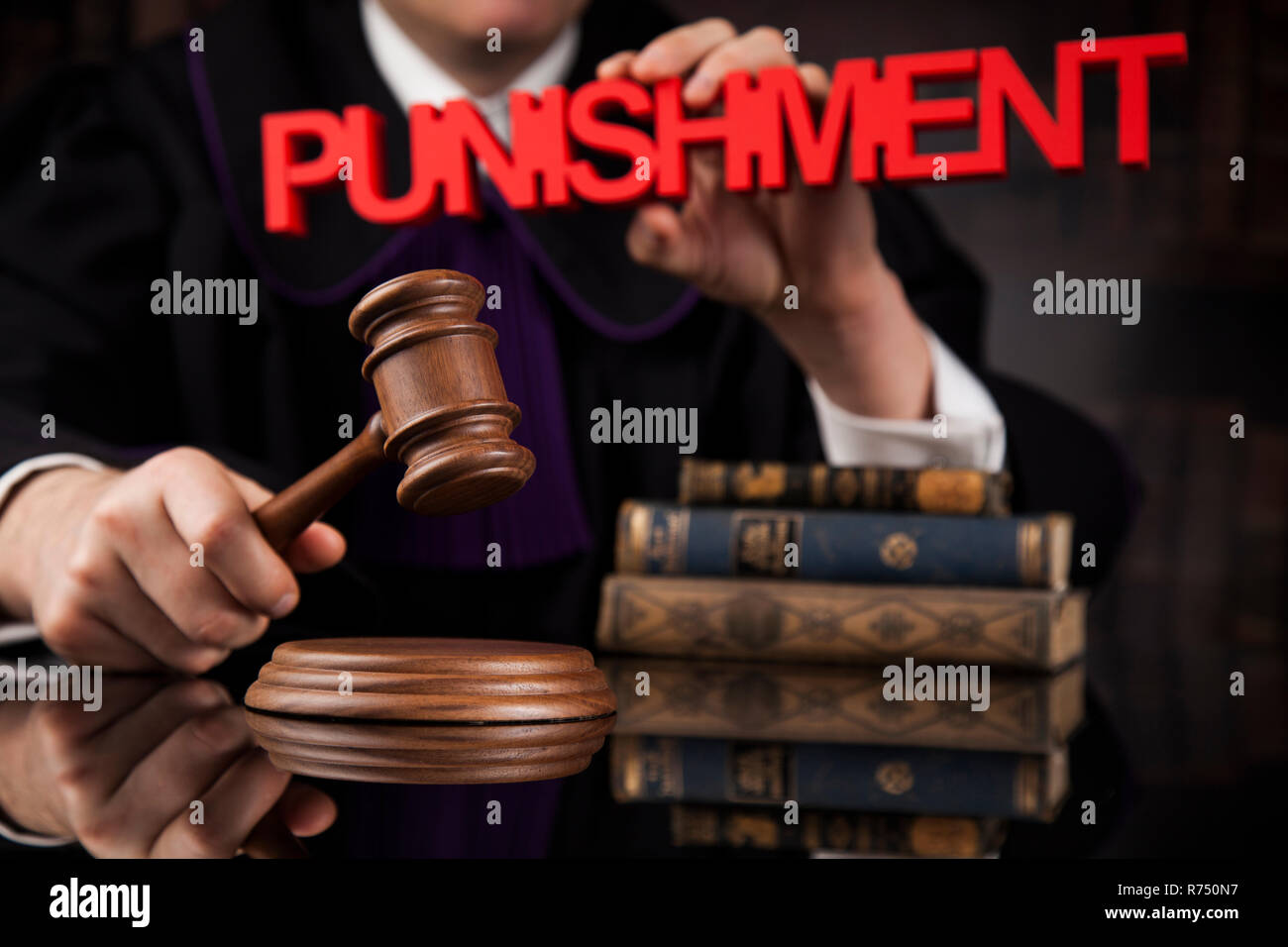 Law concept, Male judge in a courtroom striking the gavel Stock Photo ...