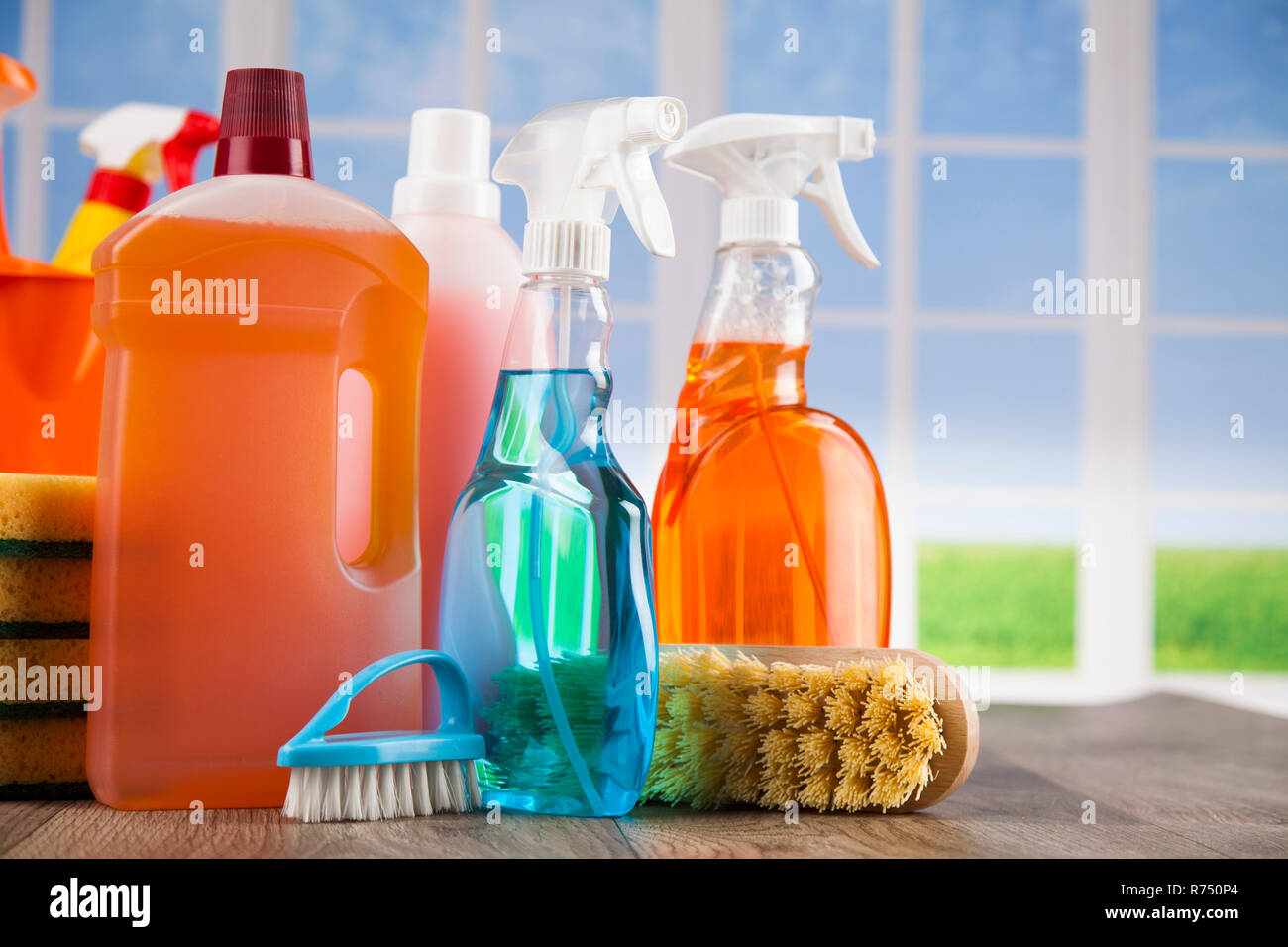 House cleaning product on wood table and window background Stock Photo ...