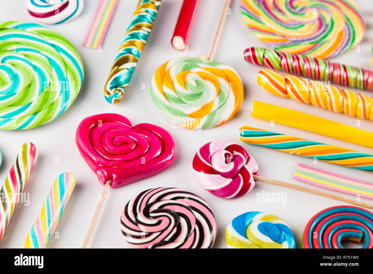 Colorful gum sweet candy and lollipops and gum balls Stock Photo - Alamy