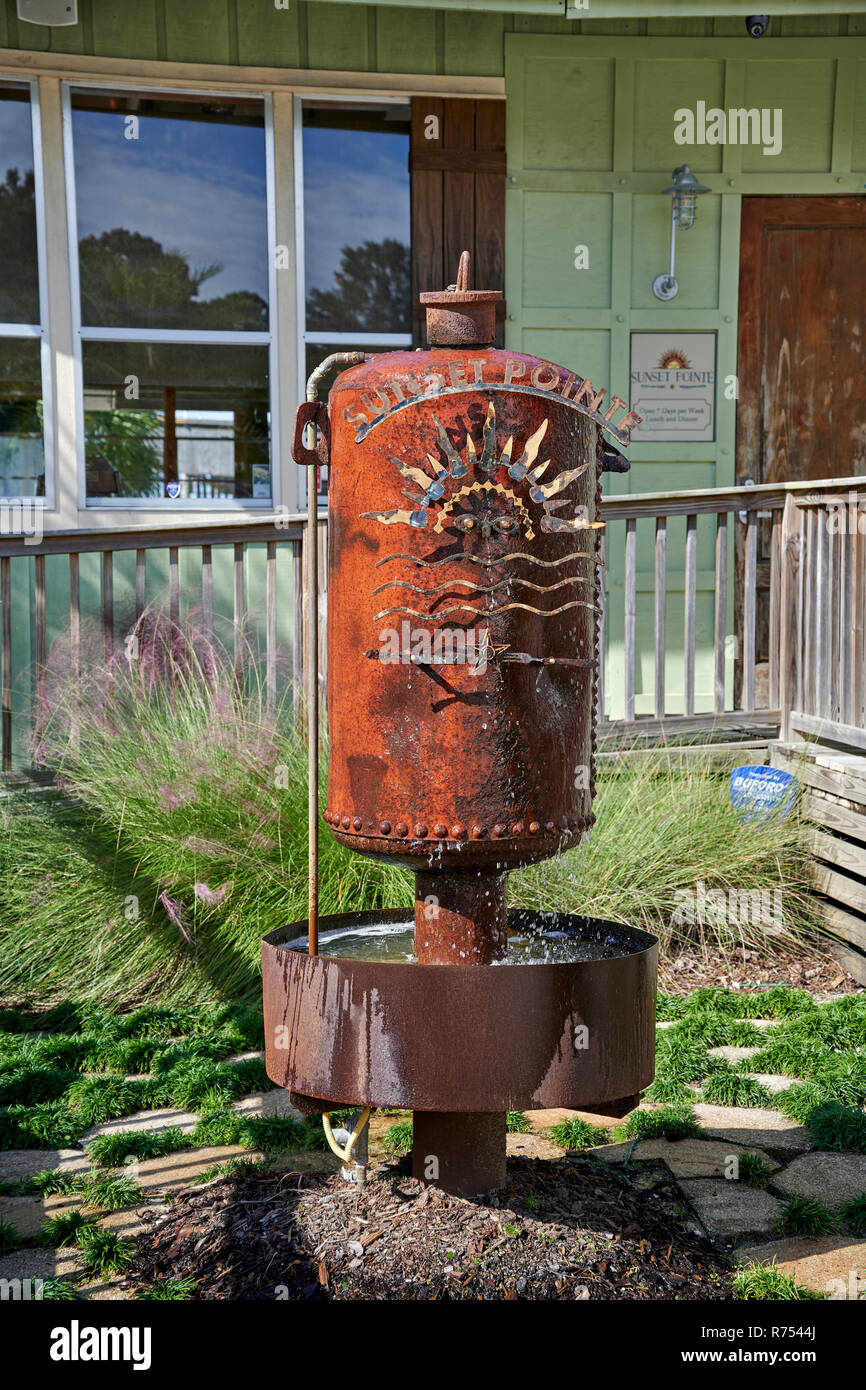 Unique metal water fountain or water feature at Sunset Pointe Marina ...