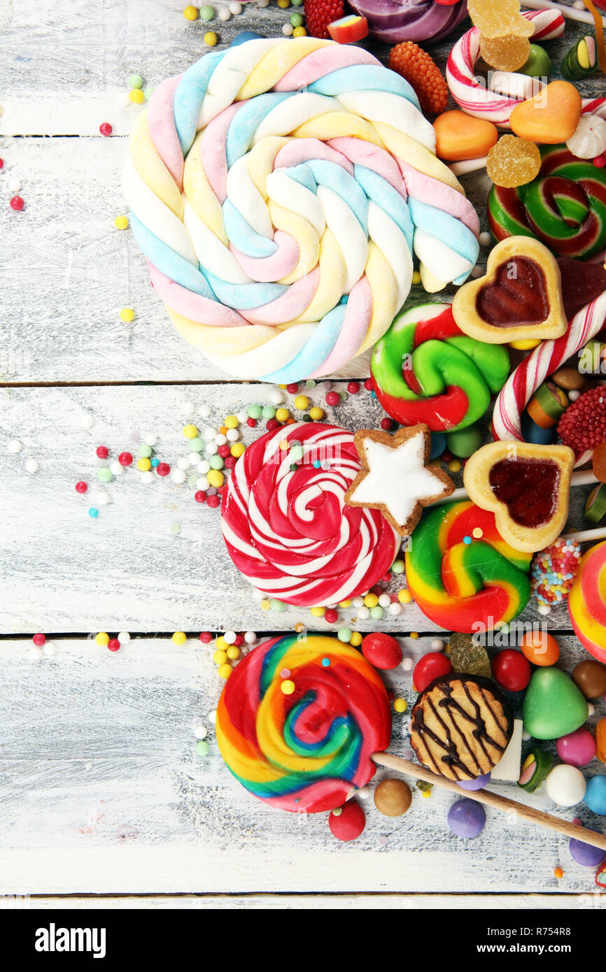 candies with jelly and sugar. colorful array of different childs sweets ...