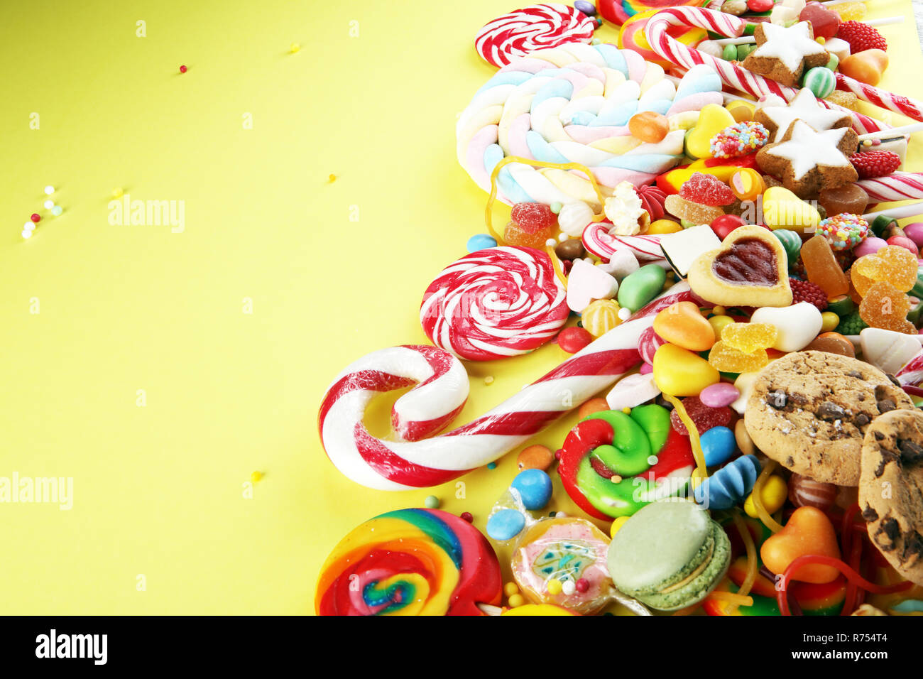 candies with jelly and sugar. colorful array of different childs sweets ...