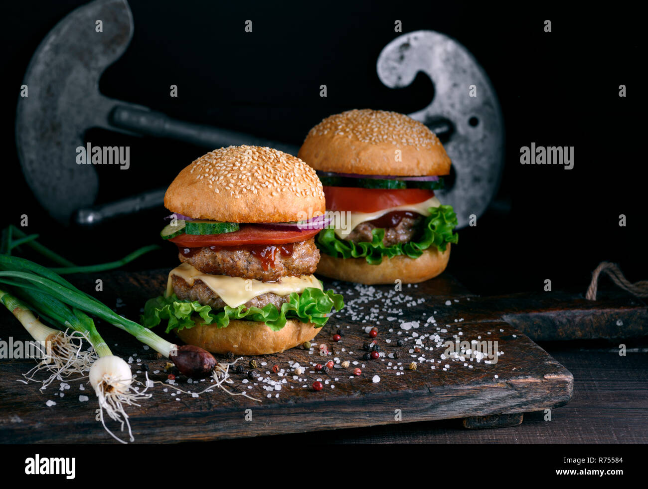 double burger with vegetables and cheese Stock Photo - Alamy
