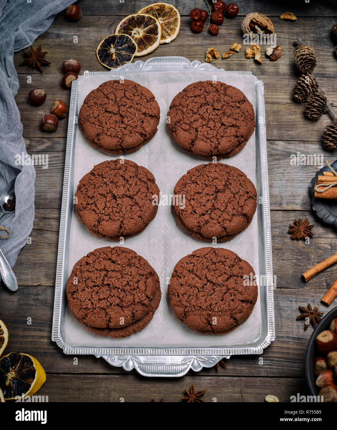 chocolate round biscuit on an iron plate Stock Photo - Alamy