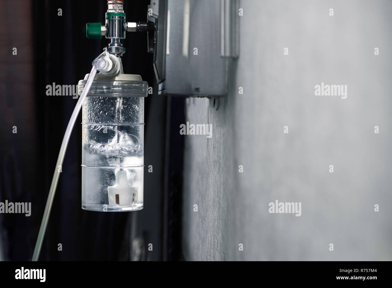 Oxygen regulator with humidifier medical equipment at hospital room ...