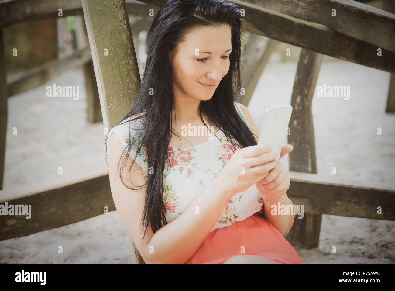 Beautiful brunette girl writes message hi-res stock photography and ...