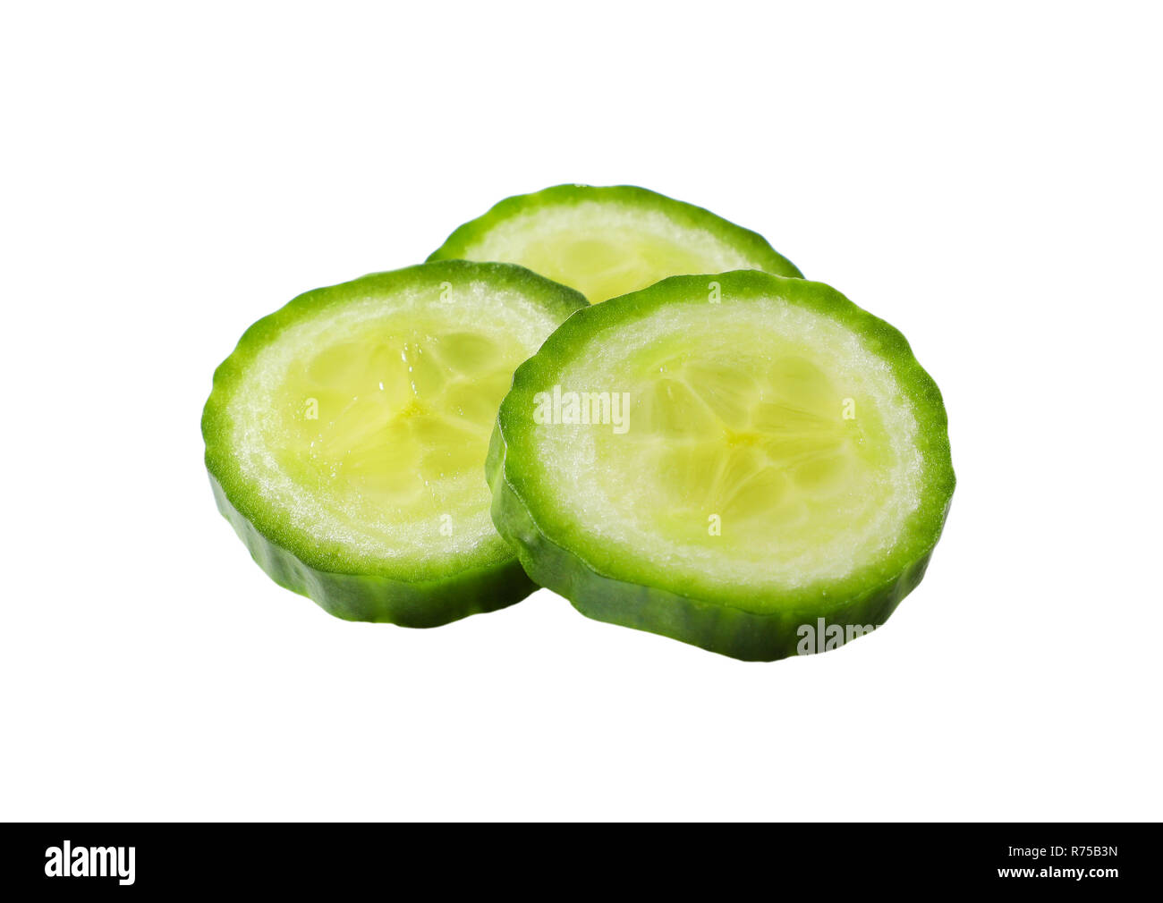 Cucumber pieces Cut Out Stock Images & Pictures - Alamy