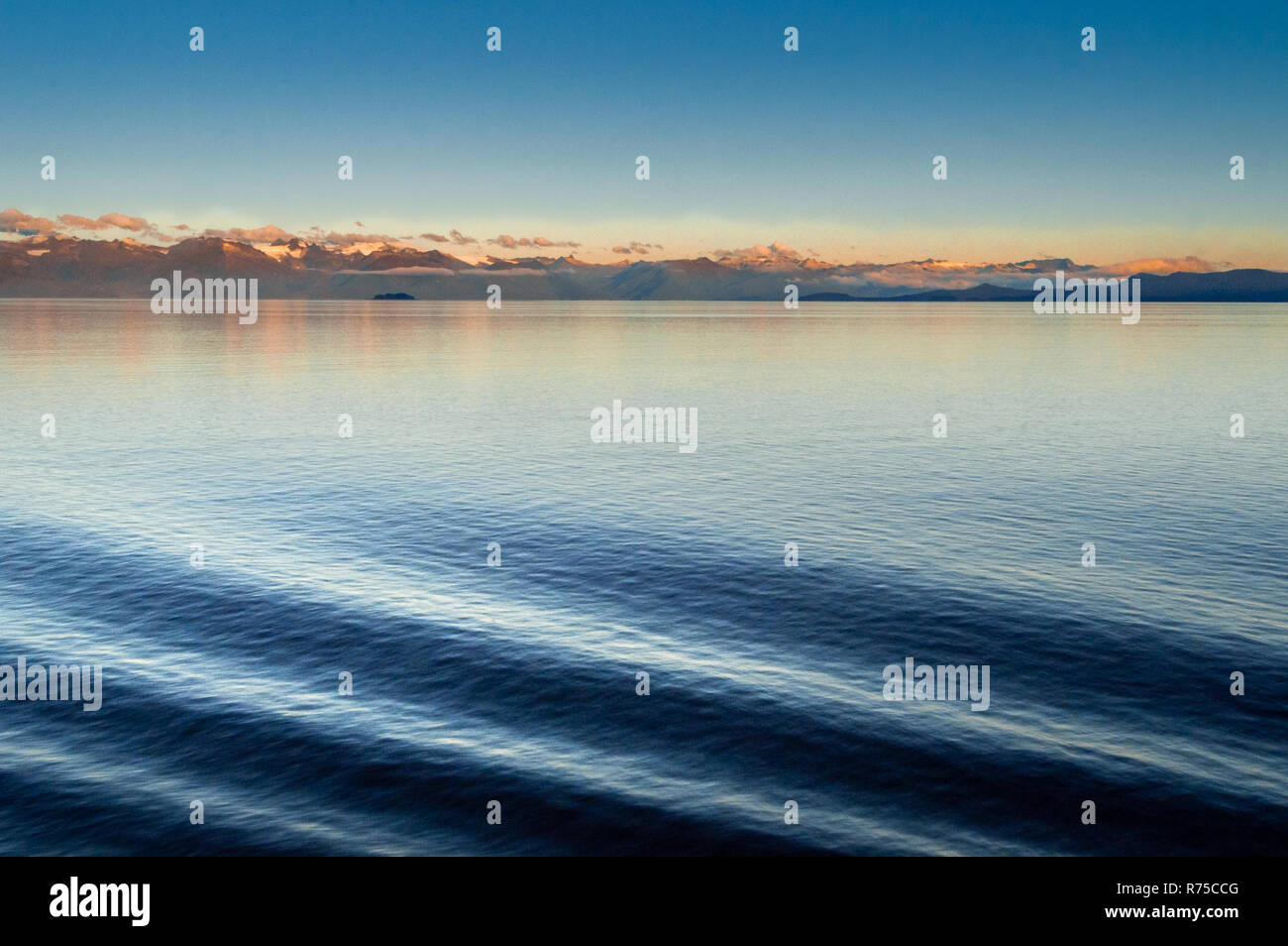 Ship bow wave ripples, Port side, in the quiet light of dawn with ...