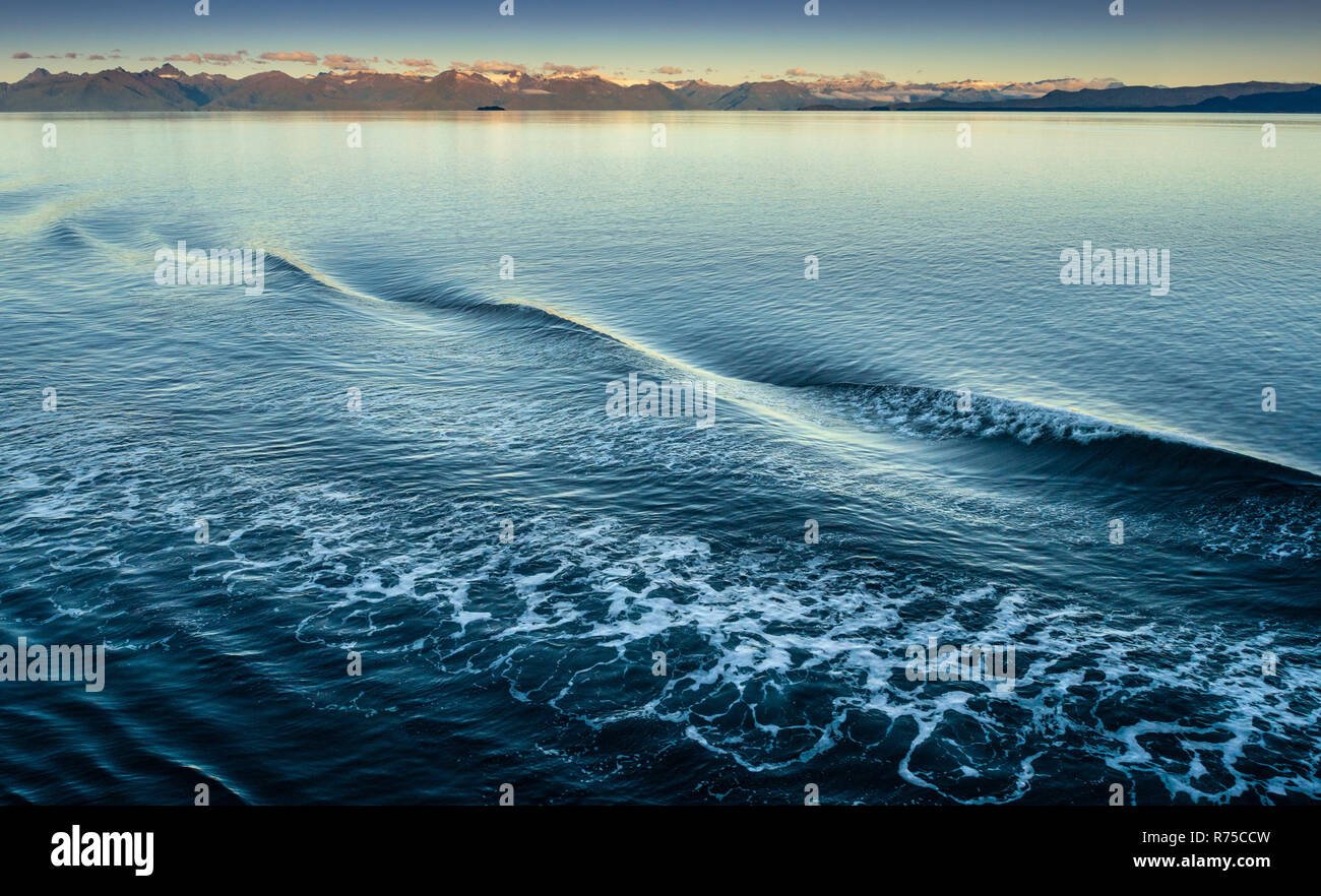 Ship bow wave ripples, Port side, in the quiet light of dawn with ...