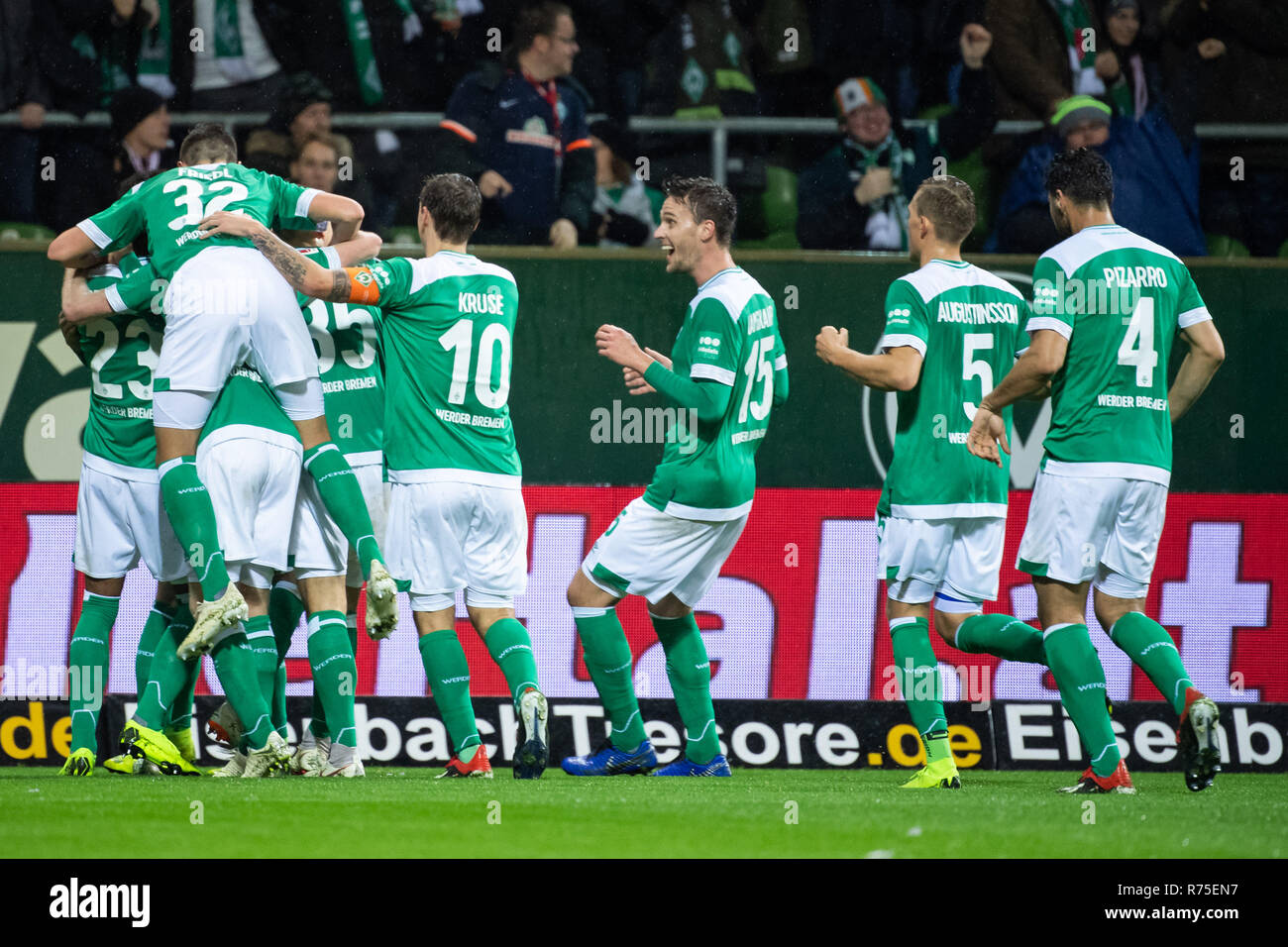 Bremen, Germany. 8th Dec, 2018. Bremen's Players celebrate their first ...