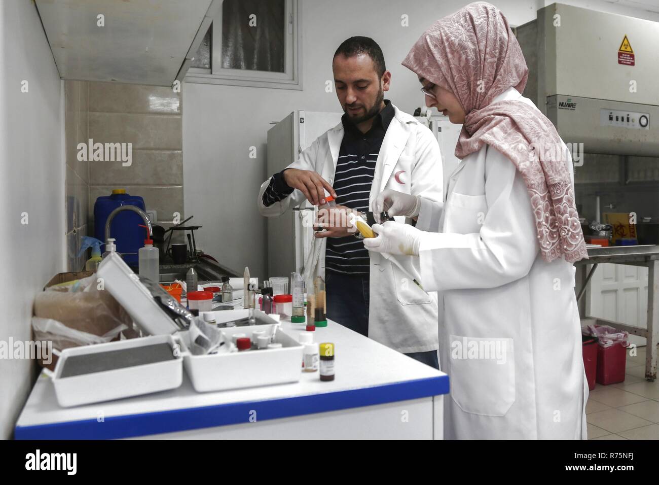 Gaza. 5th Dec, 2018. Palestinian scientists work in a laboratory in ...