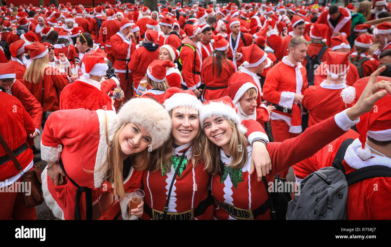 London, UK, 8th Dec 2018. Santa and his helpers having fun around ...