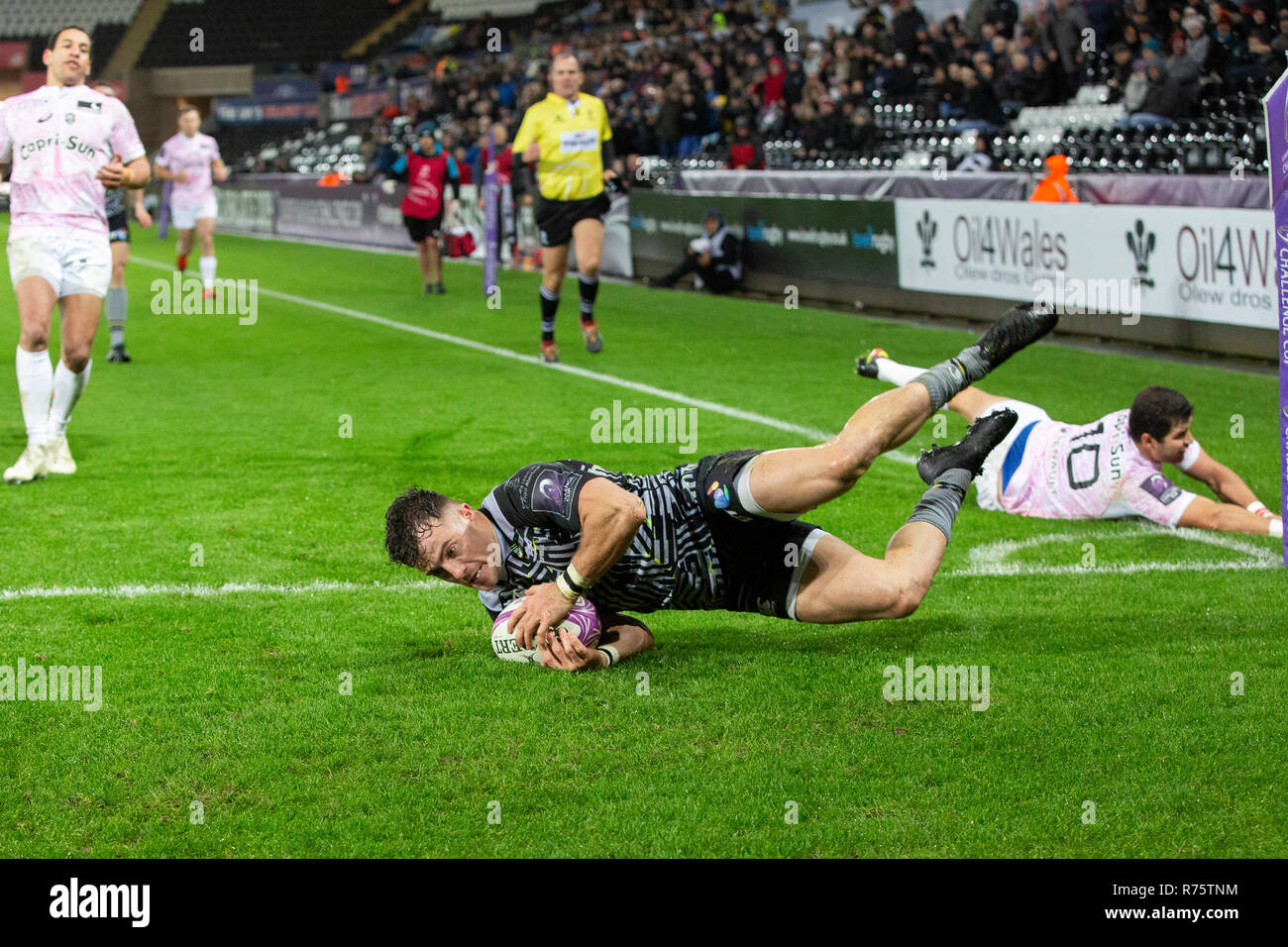 Ospreys left wing Luke Morgan goes over for a try in the Heineken ...