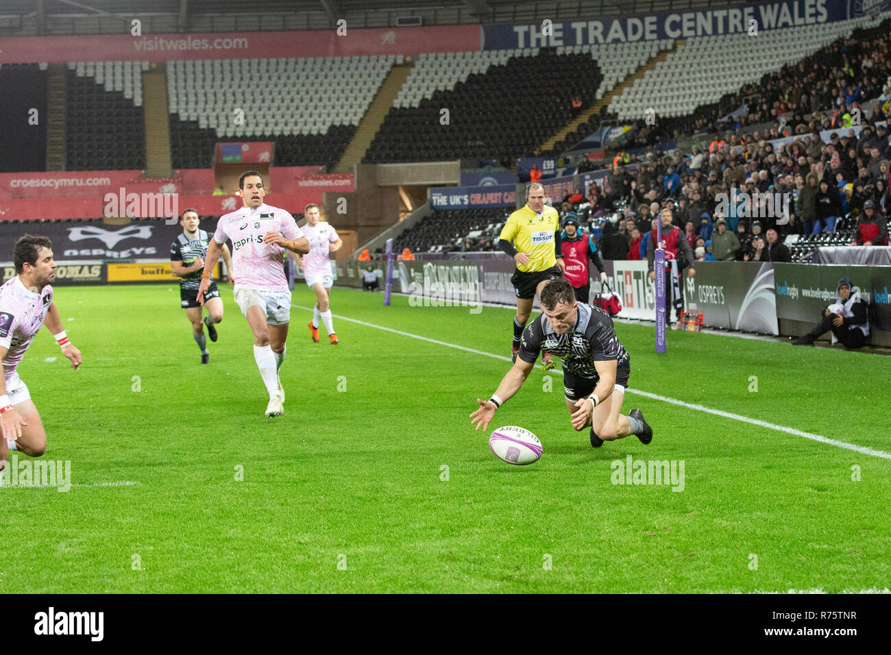 Ospreys left wing Luke Morgan goes over for a try in the Heineken ...