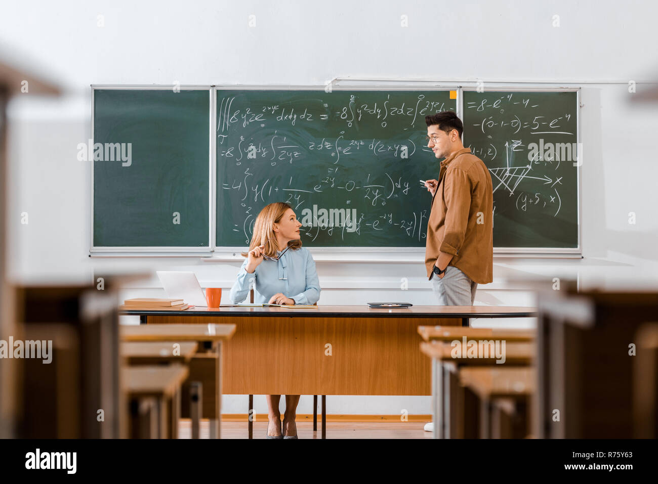 Solving equations hi-res stock photography and images - Alamy
