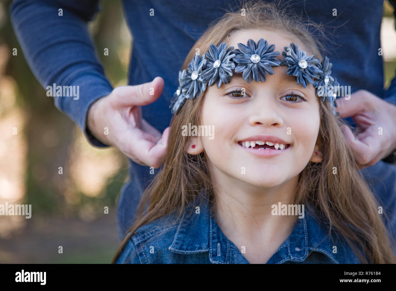 Cute Young Mixed Race Girl Having Fun Outdoors Stock Photo - Alamy