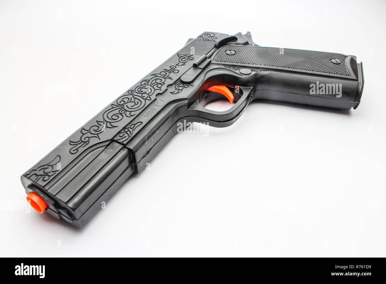 Silver toy gun hi-res stock photography and images - Alamy