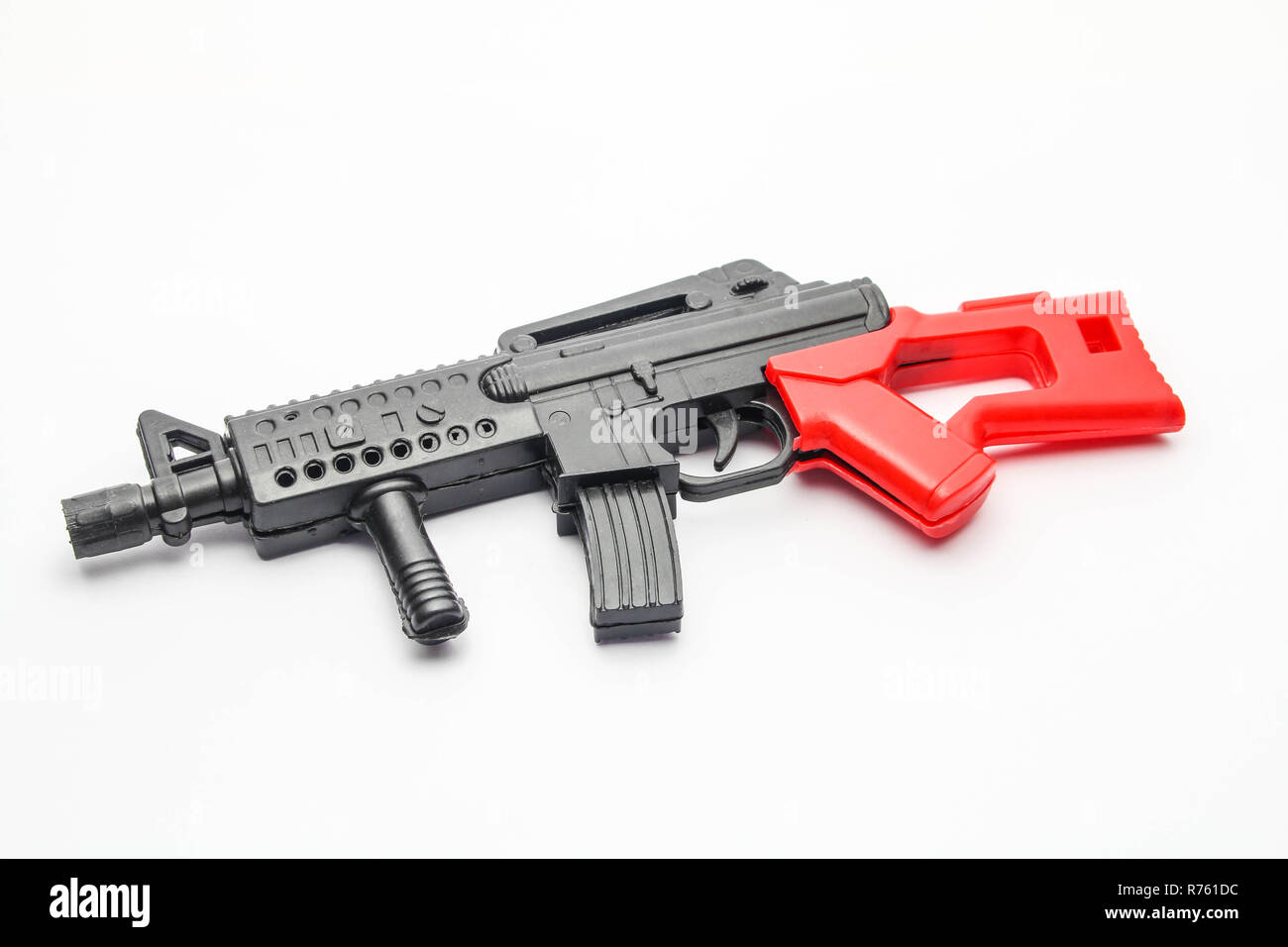 Toy plastic silver hand gun hi-res stock photography and images - Alamy