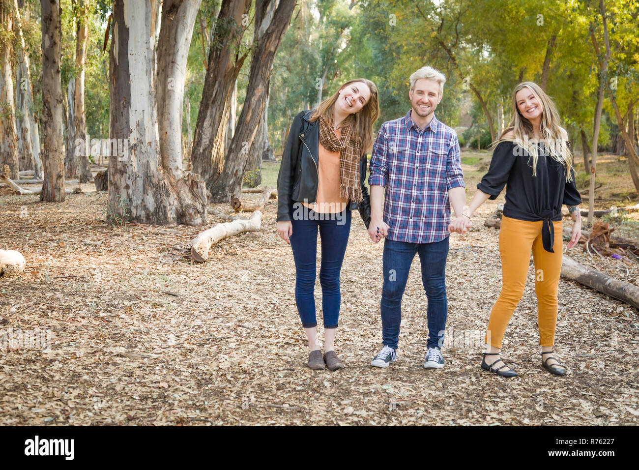 Three Brother and Sisters Portrait Outdoors Stock Photo - Alamy