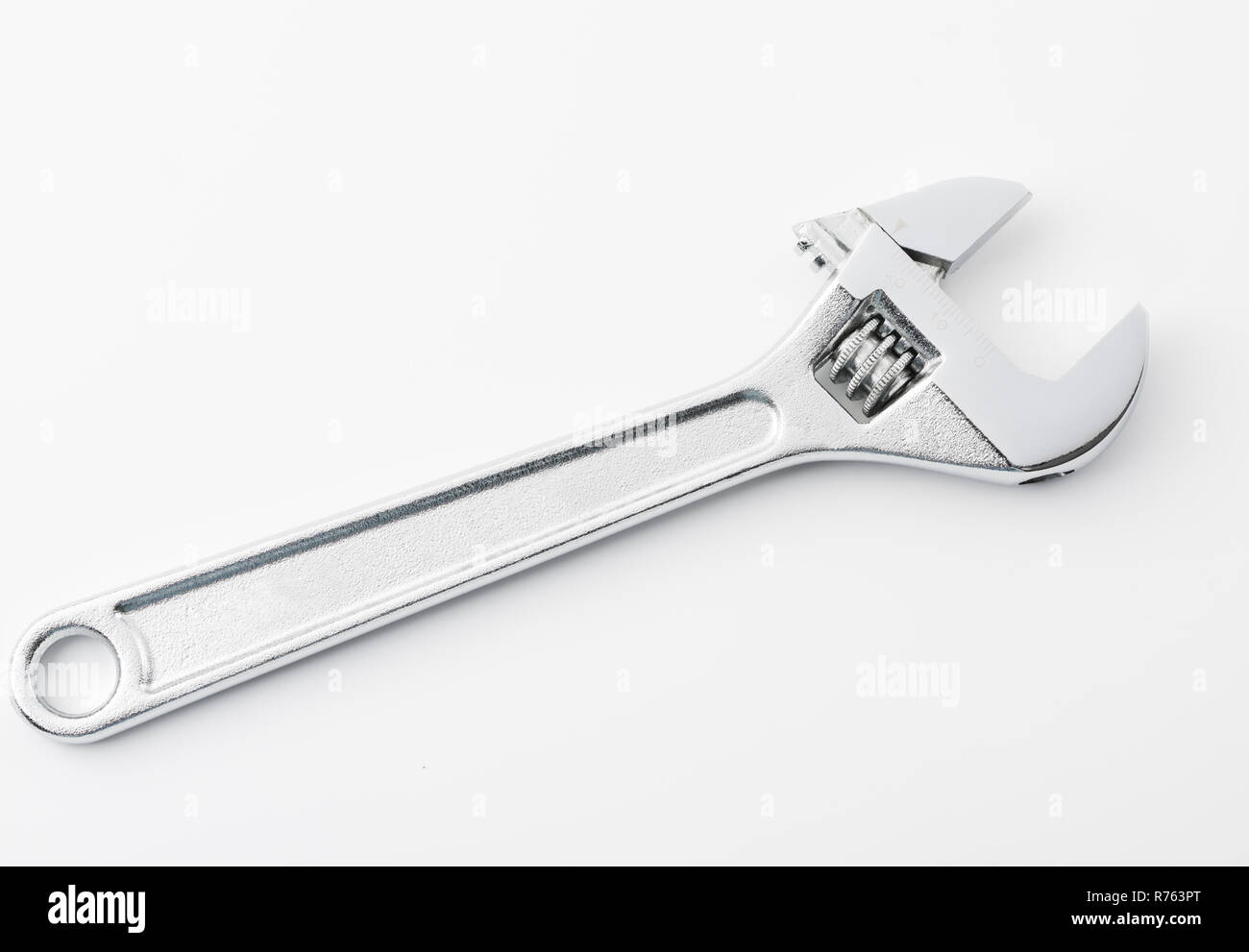 An adjustable crescent wrench tool on a white background Stock Photo ...