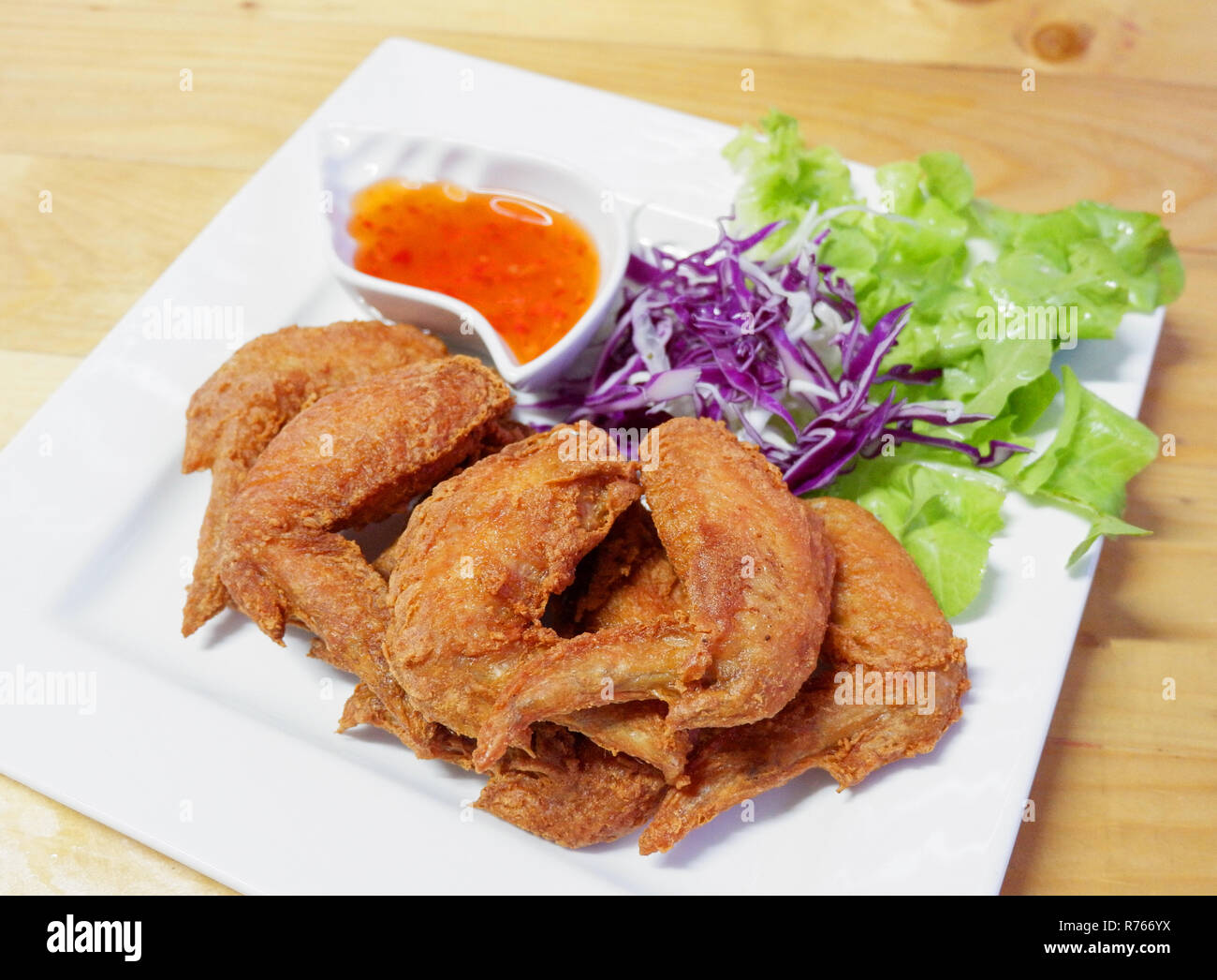 fried chicken wing / batter fried chicken crispy on white plate and ...