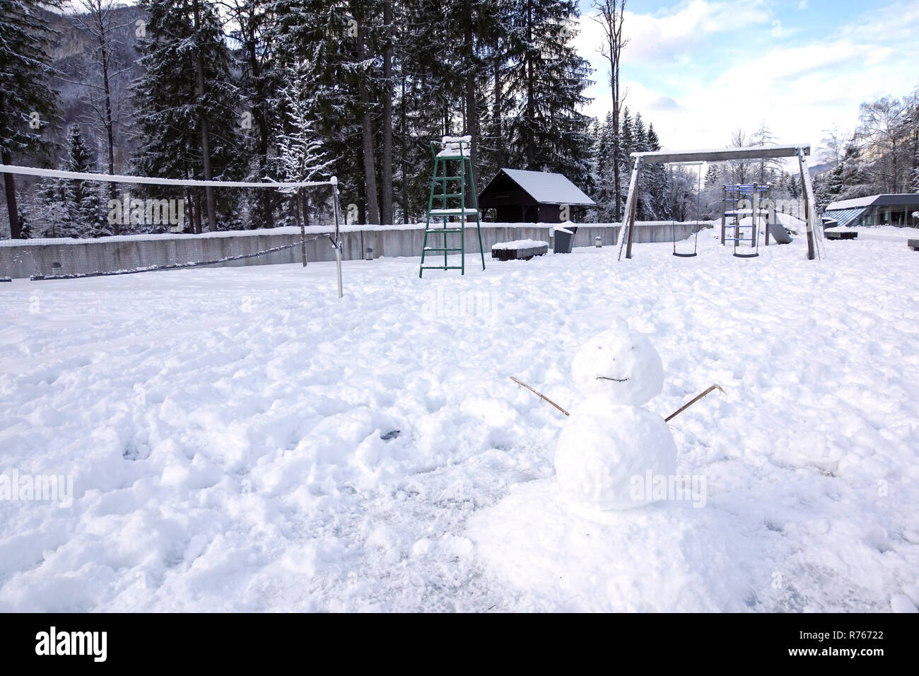 children's playground with snow in winter Stock Photo - Alamy