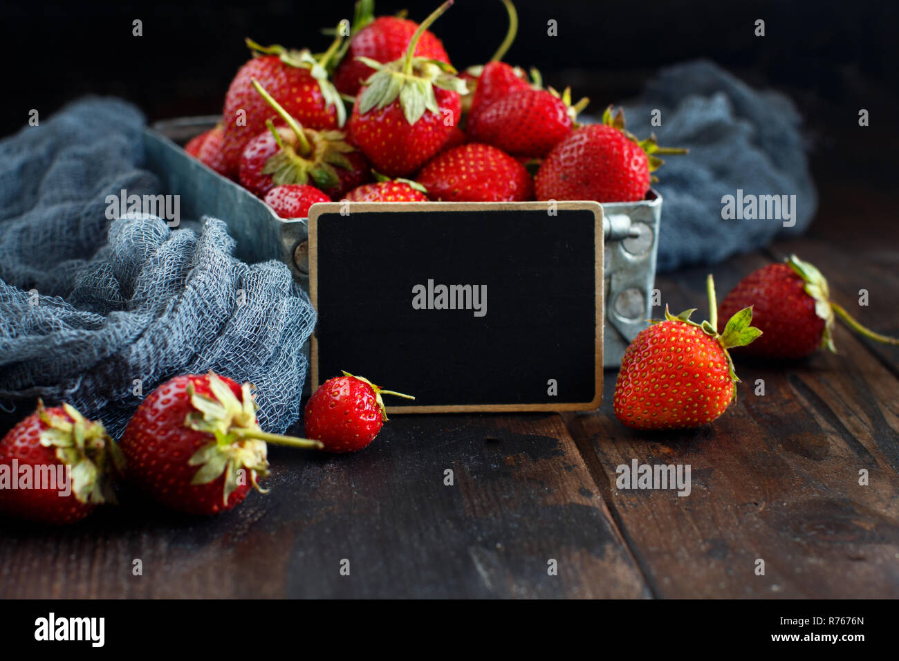 Strawberries in a box on a table Stock Photo - Alamy