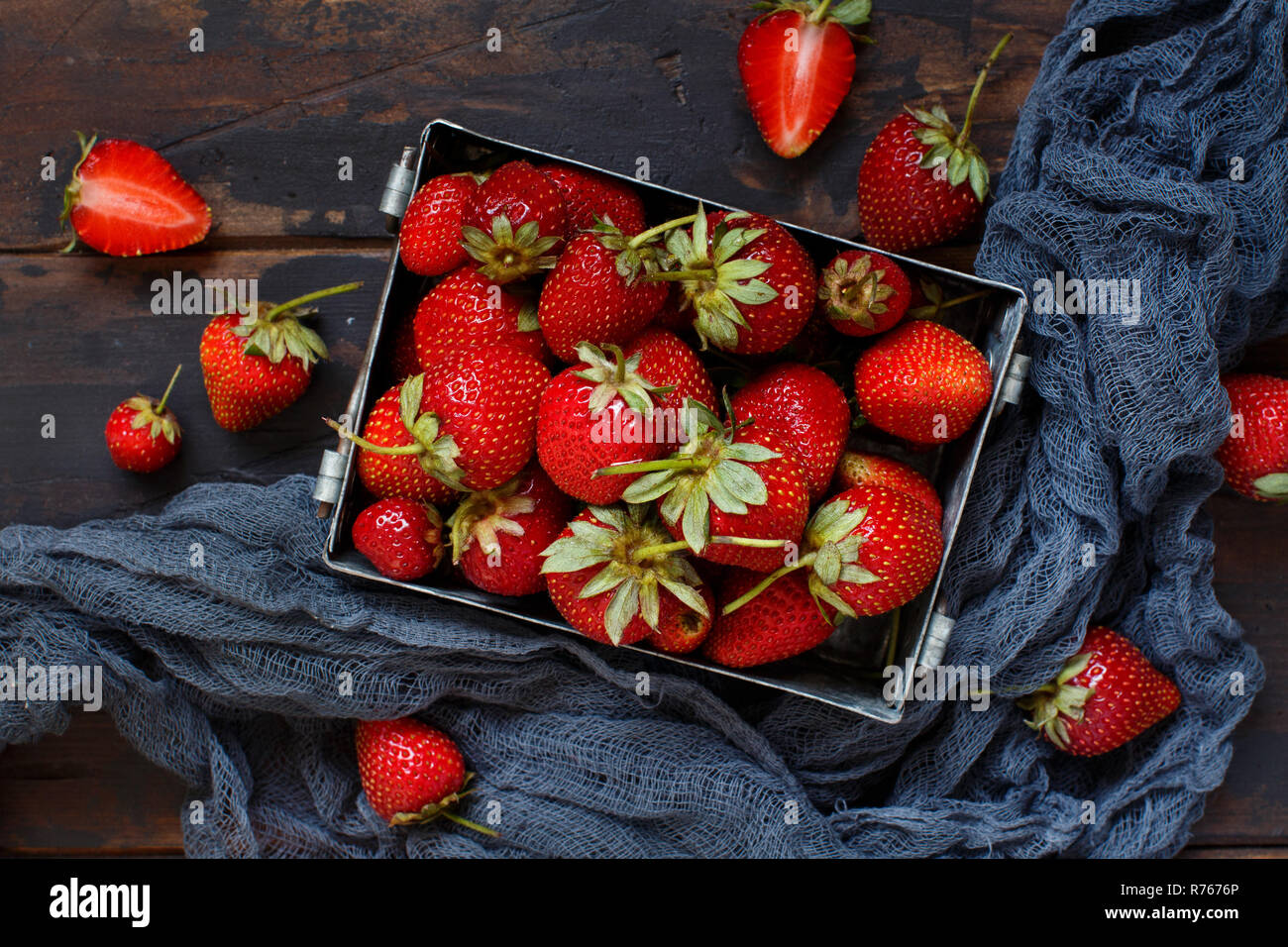 Strawberries in a box on a table Stock Photo - Alamy