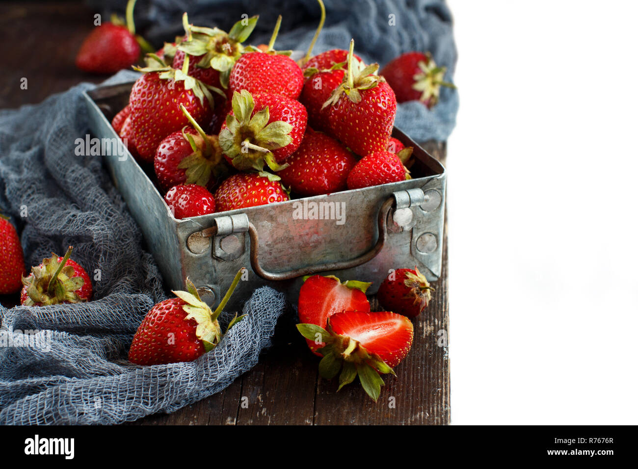Strawberries in a box on a table Stock Photo - Alamy