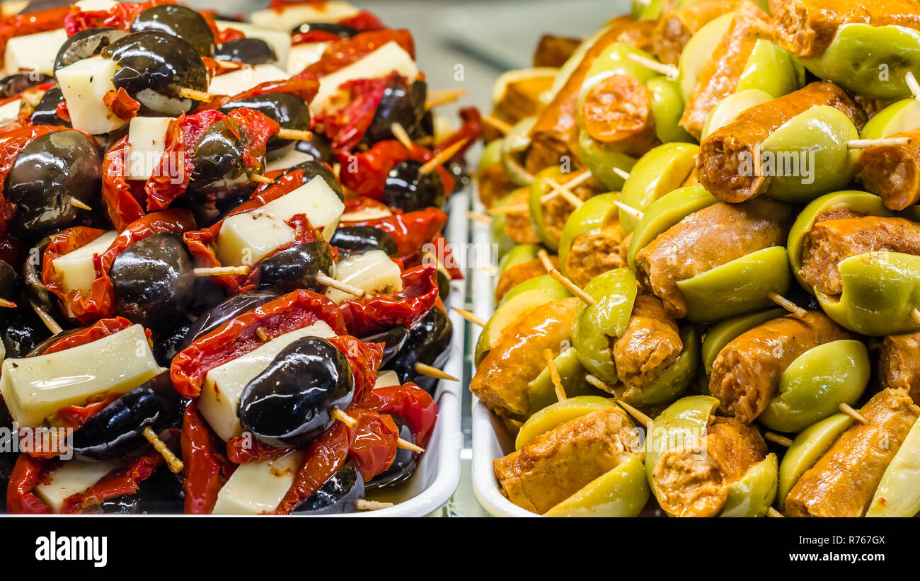 Typical Spanish olive tapas in a bar Stock Photo - Alamy