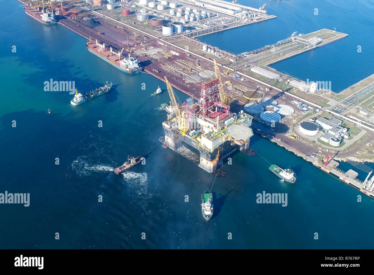 Drilling platform in the port. Towing of the oil platform Stock Photo ...