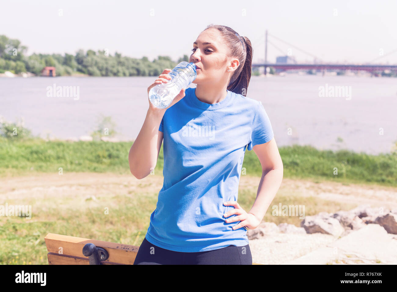 Fitness girl refreshing Stock Photo - Alamy