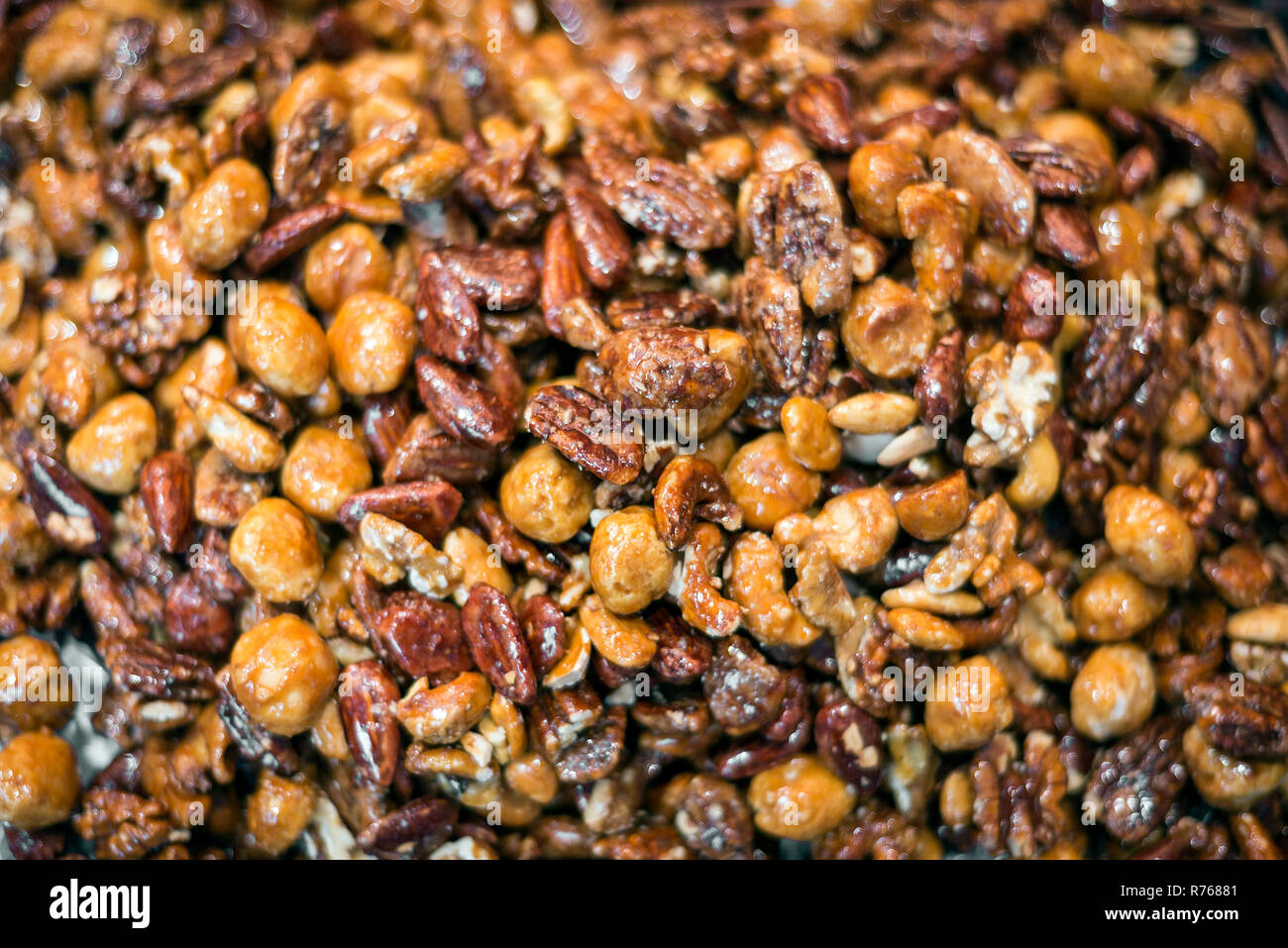 honey roasted mixed nuts sweet healthy snack Stock Photo - Alamy