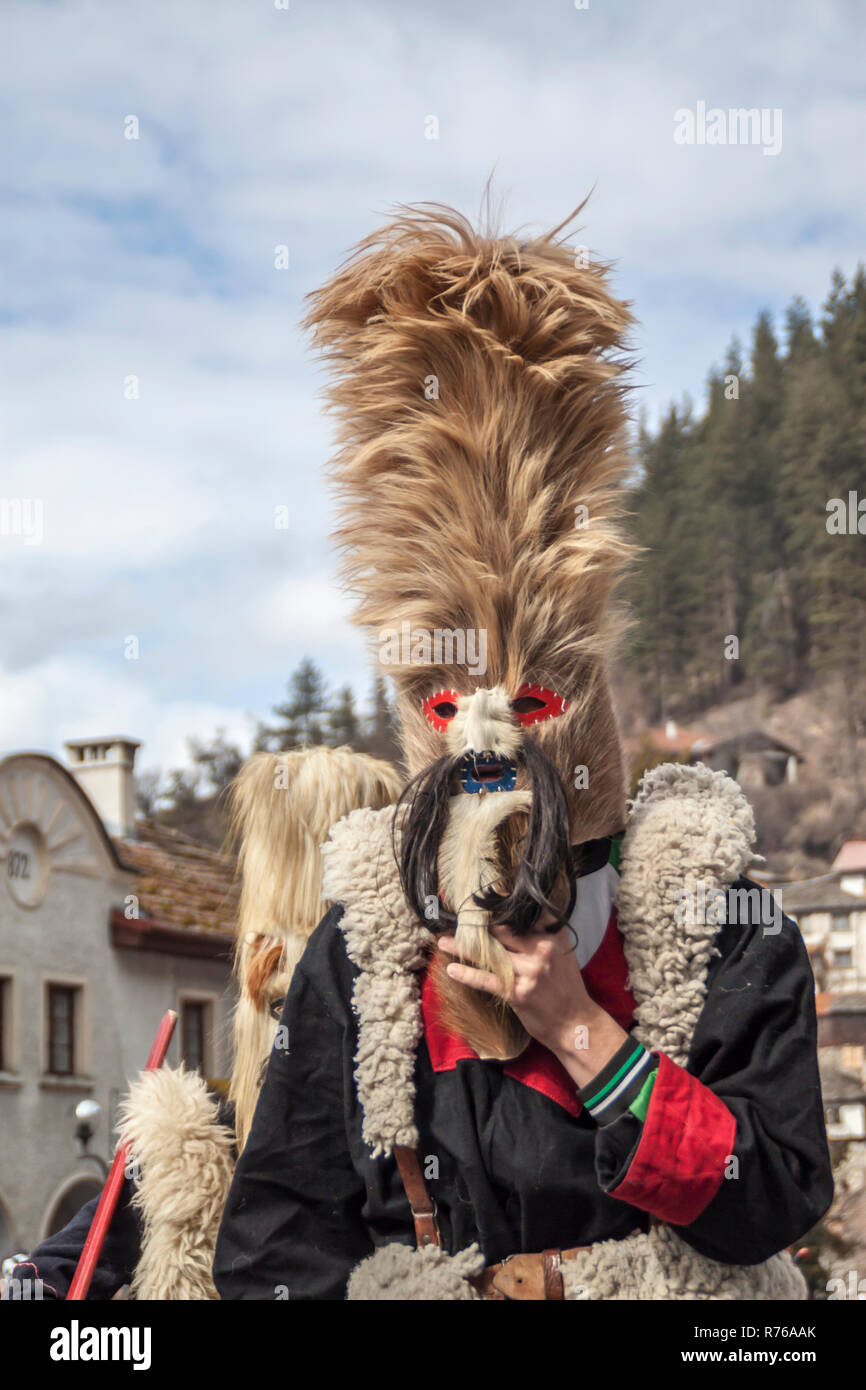 SHIROKA LAKA, BULGARIA - MARCH 01, 2015 - Kukeri mask festival and ...