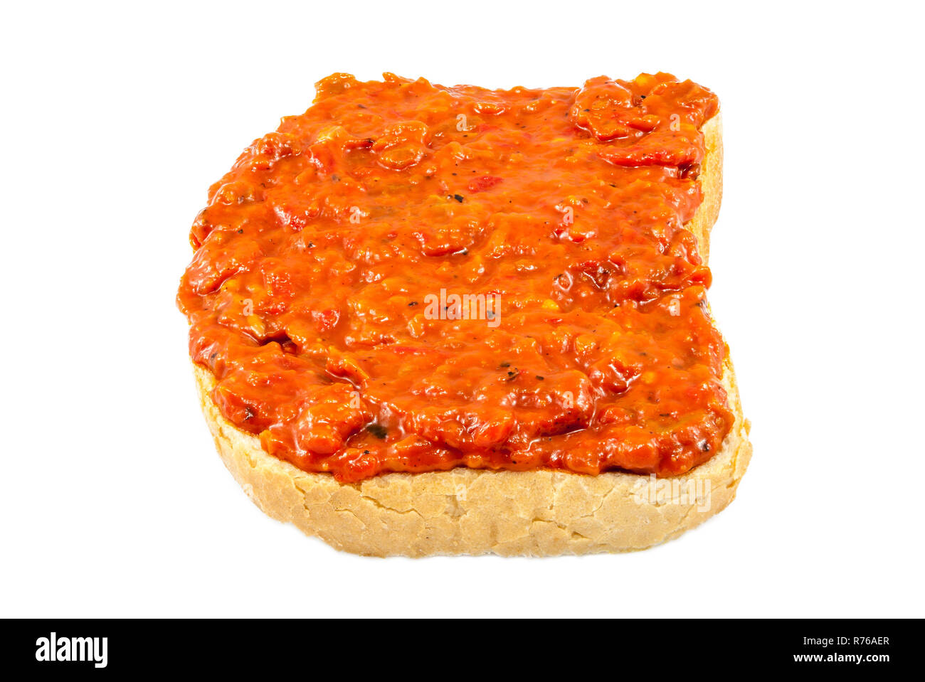 Traditional Bulgarian relish called Lutenica. Spread on a slice of ...