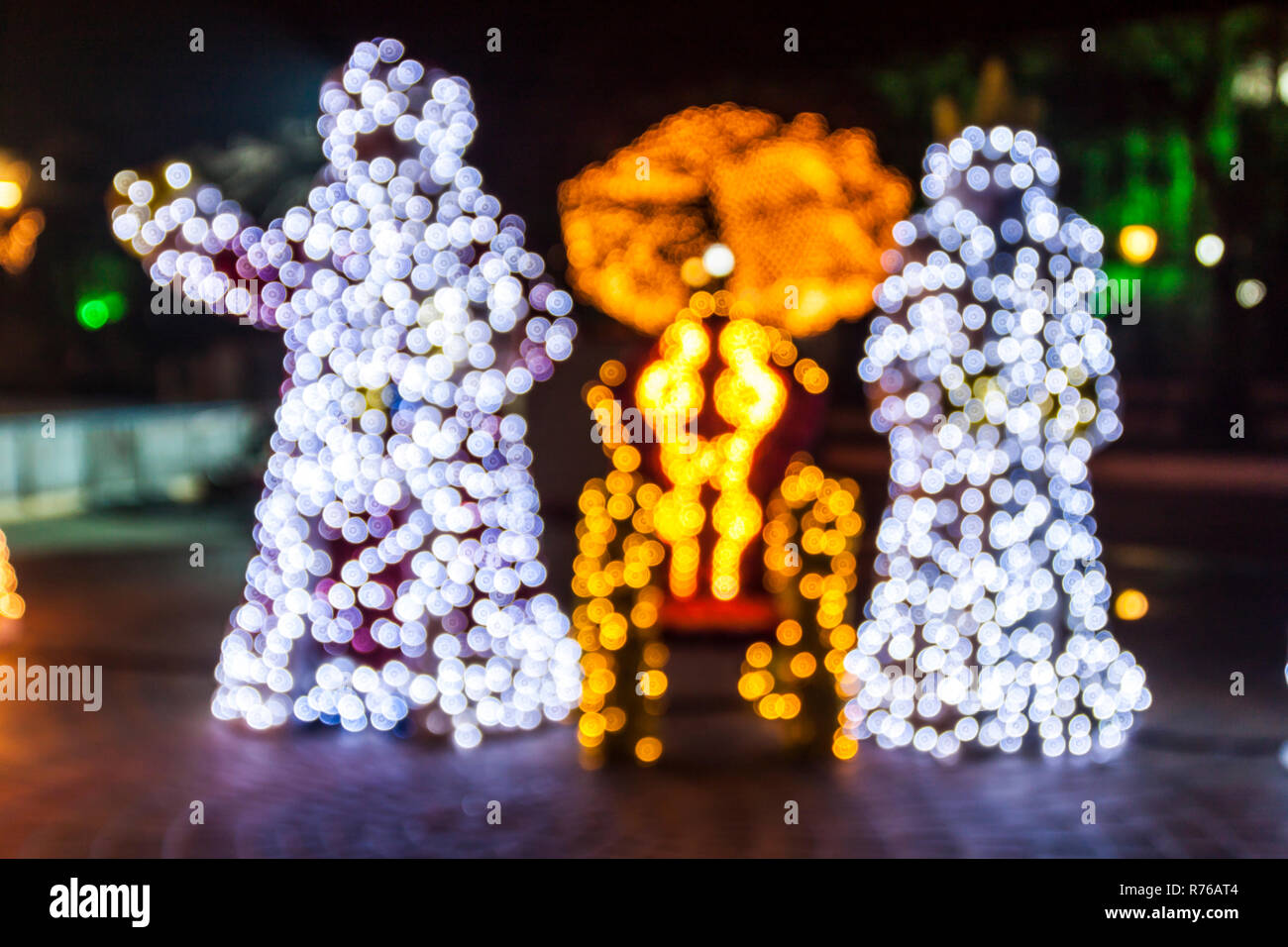Santa Claus and Snow White statues decorated with lights Stock Photo ...