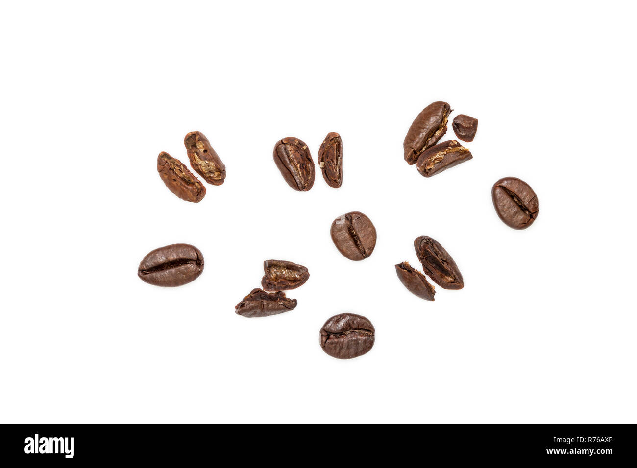 Whole and broken coffee beans isolated on white Stock Photo - Alamy