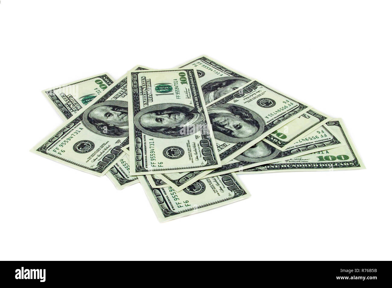 Pile of one hundred dollar bills on a white background Stock Photo - Alamy
