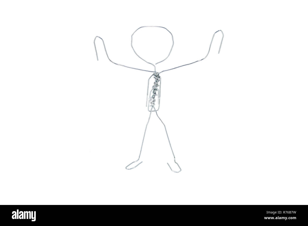 Standing paperclip figure with hands up isolated on a white background ...