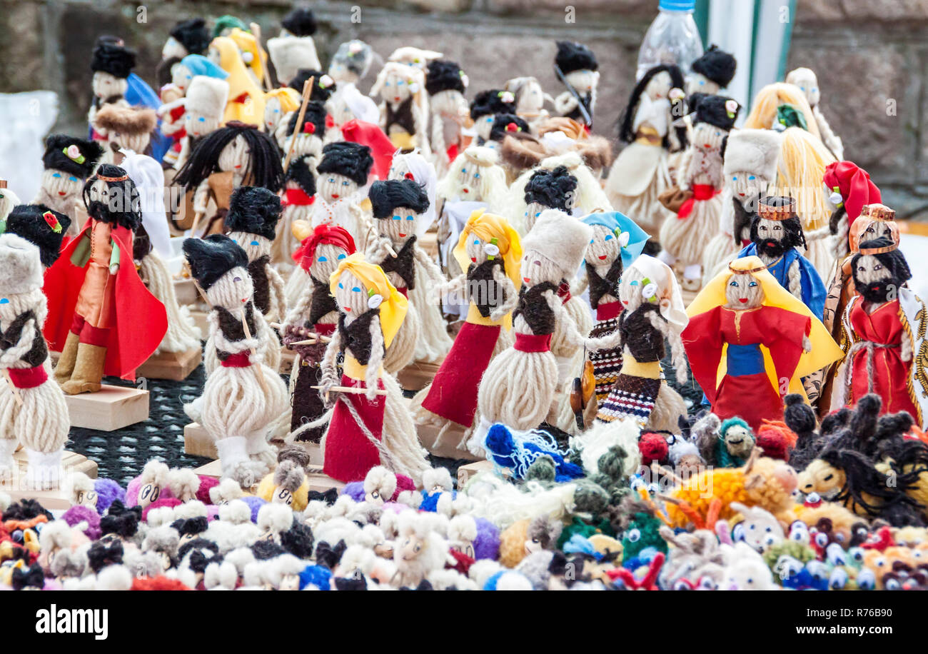 Handmade dolls from color threads Stock Photo - Alamy