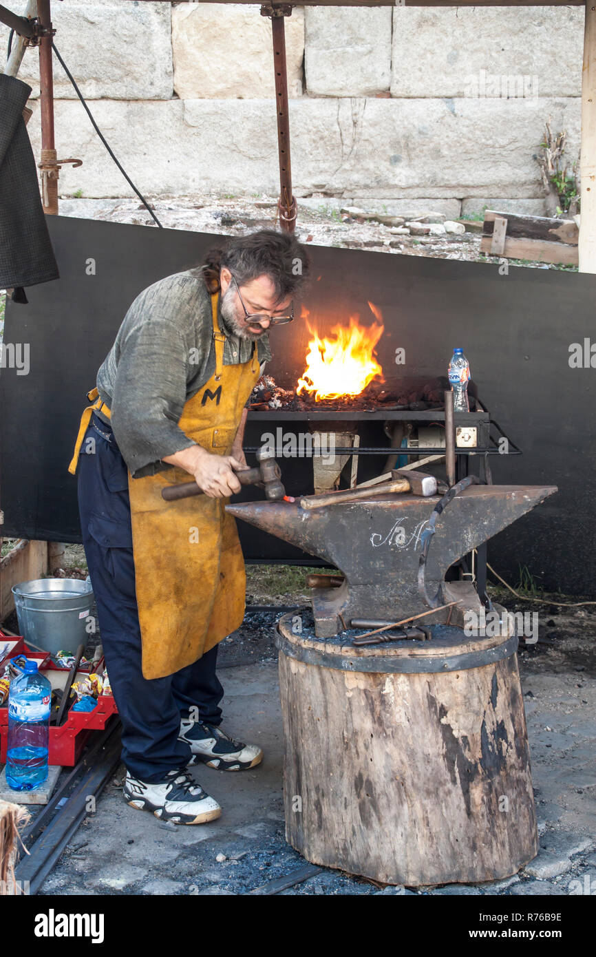 Blacksmith working on his next masterpiece Stock Photo - Alamy
