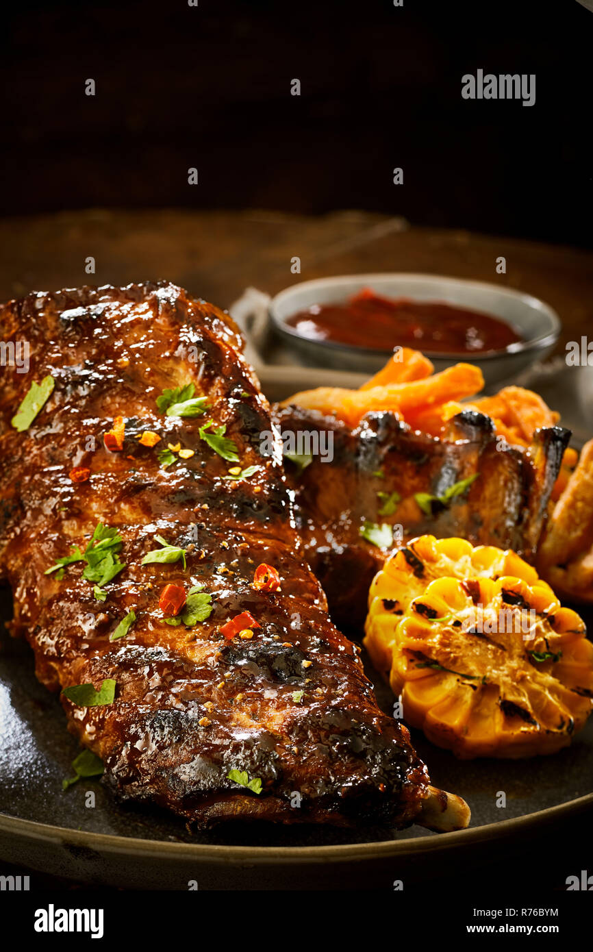 Spicy portion of barbecued spare ribs with chili Stock Photo - Alamy