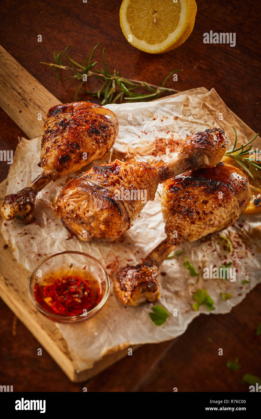 Spicy seasoned chicken legs marinated in chili Stock Photo - Alamy