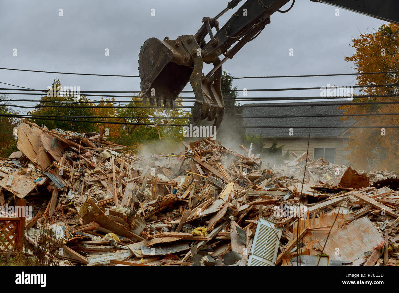 house destroyed bricks, sticks trees, debris beam natural disaster ...