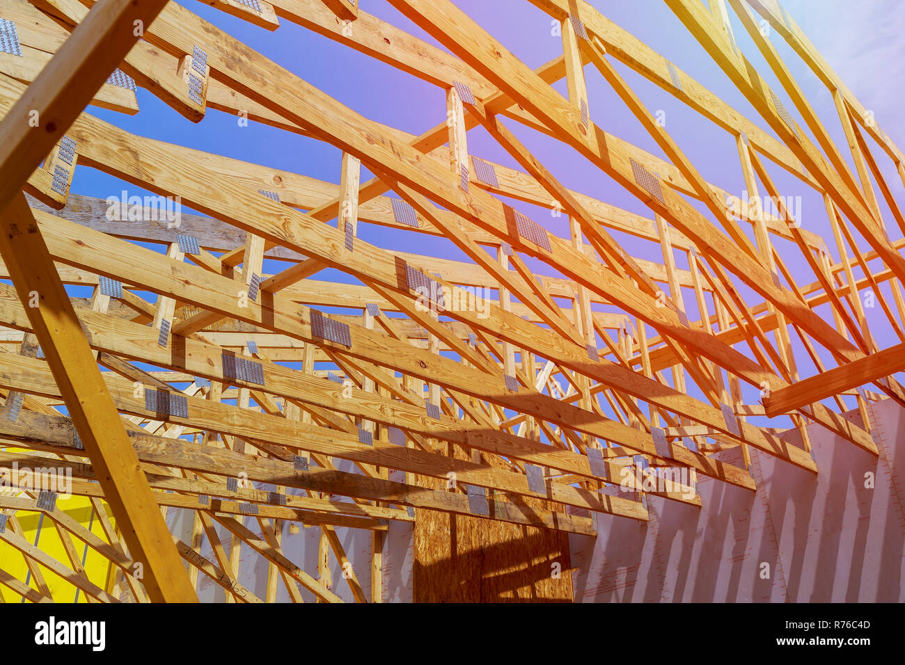 A stick built house under construction New build with wooden truss ...
