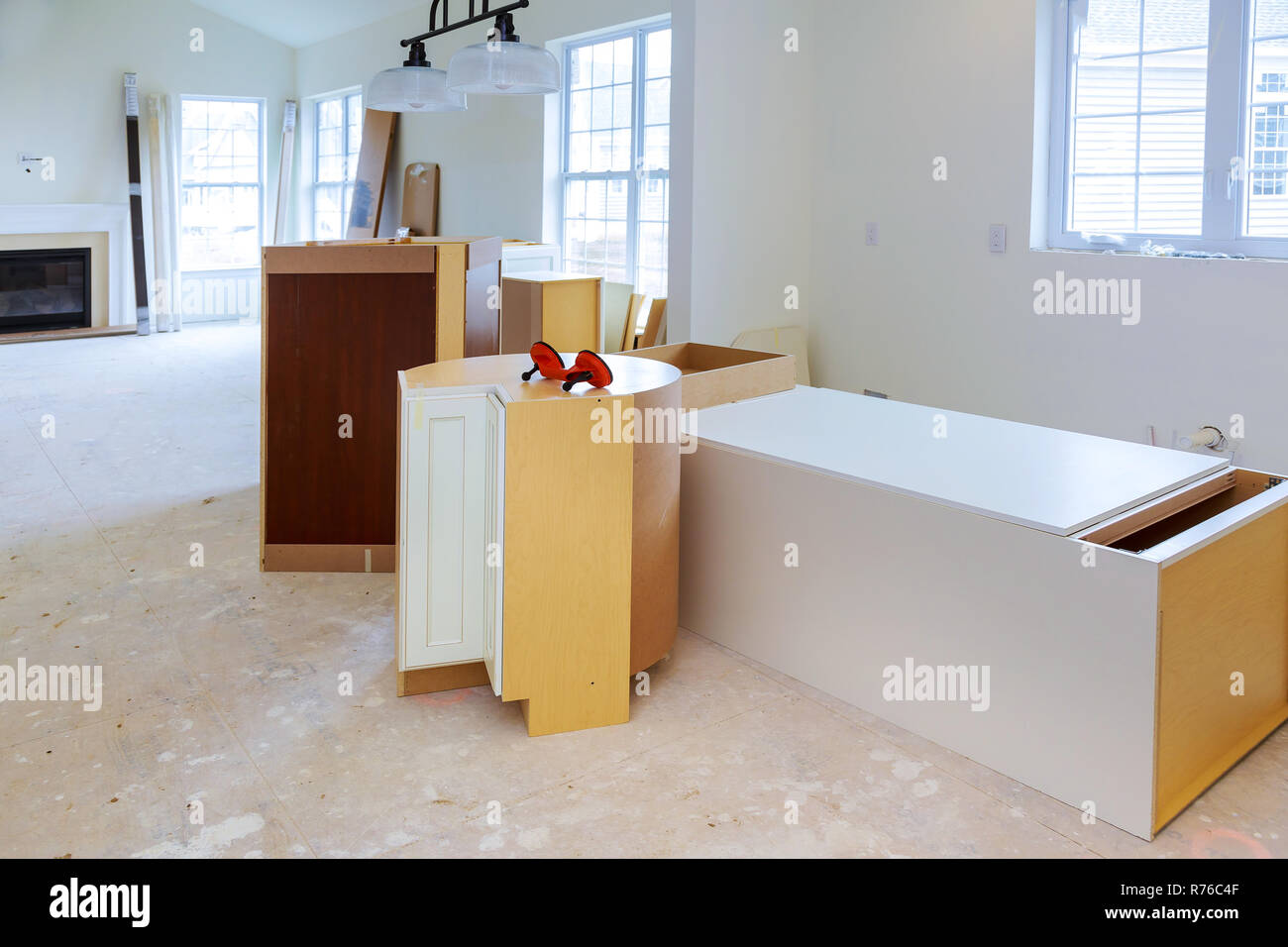 Installing new induction hob in modern kitchen cabinets installation ...