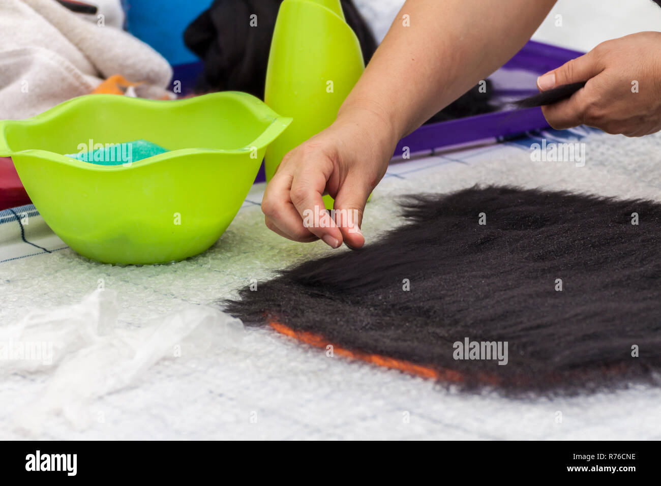 Old fashioned wool felting using only soap and water Stock Photo - Alamy