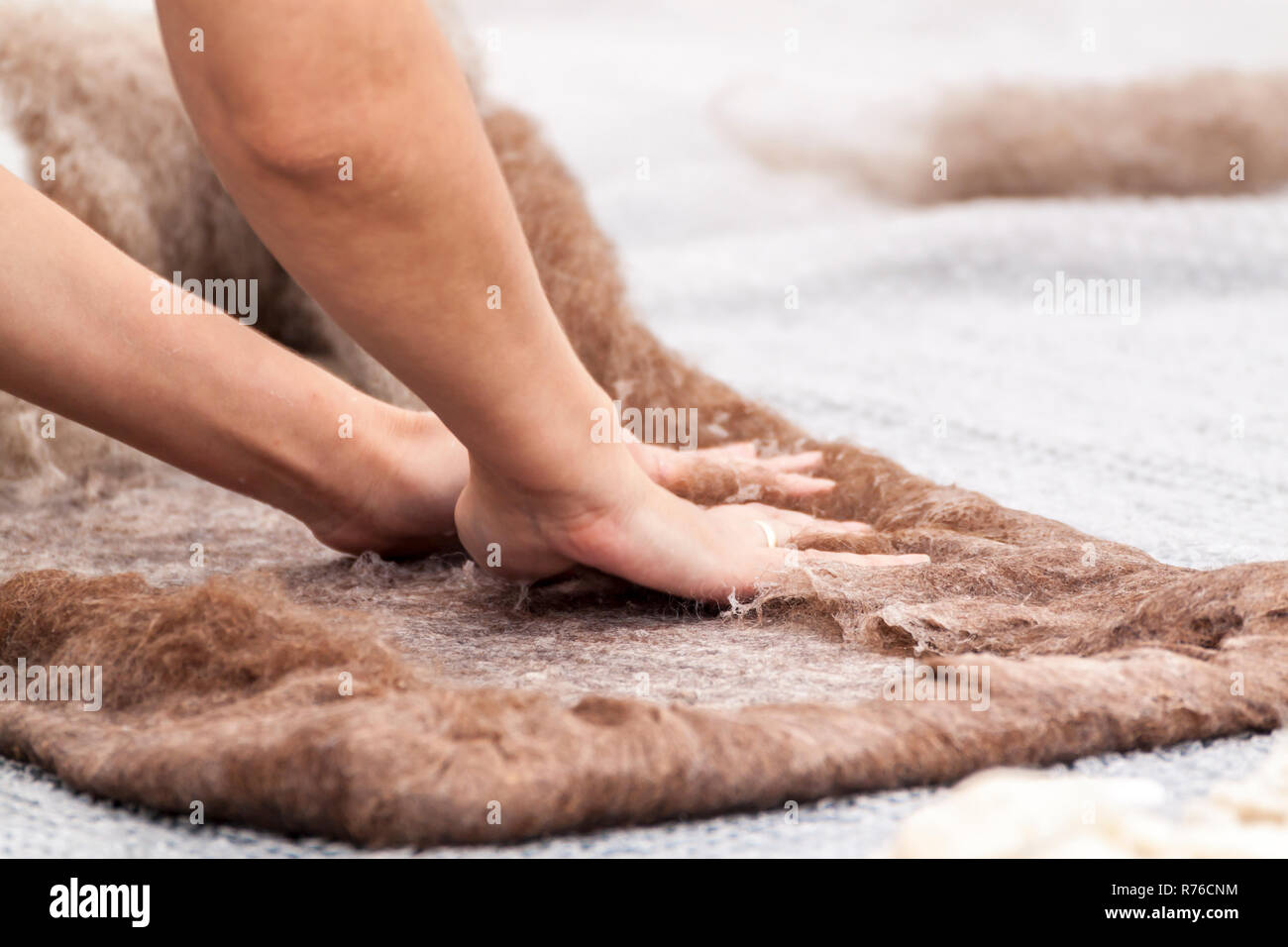 Old fashioned wool felting using only soap and water Stock Photo - Alamy