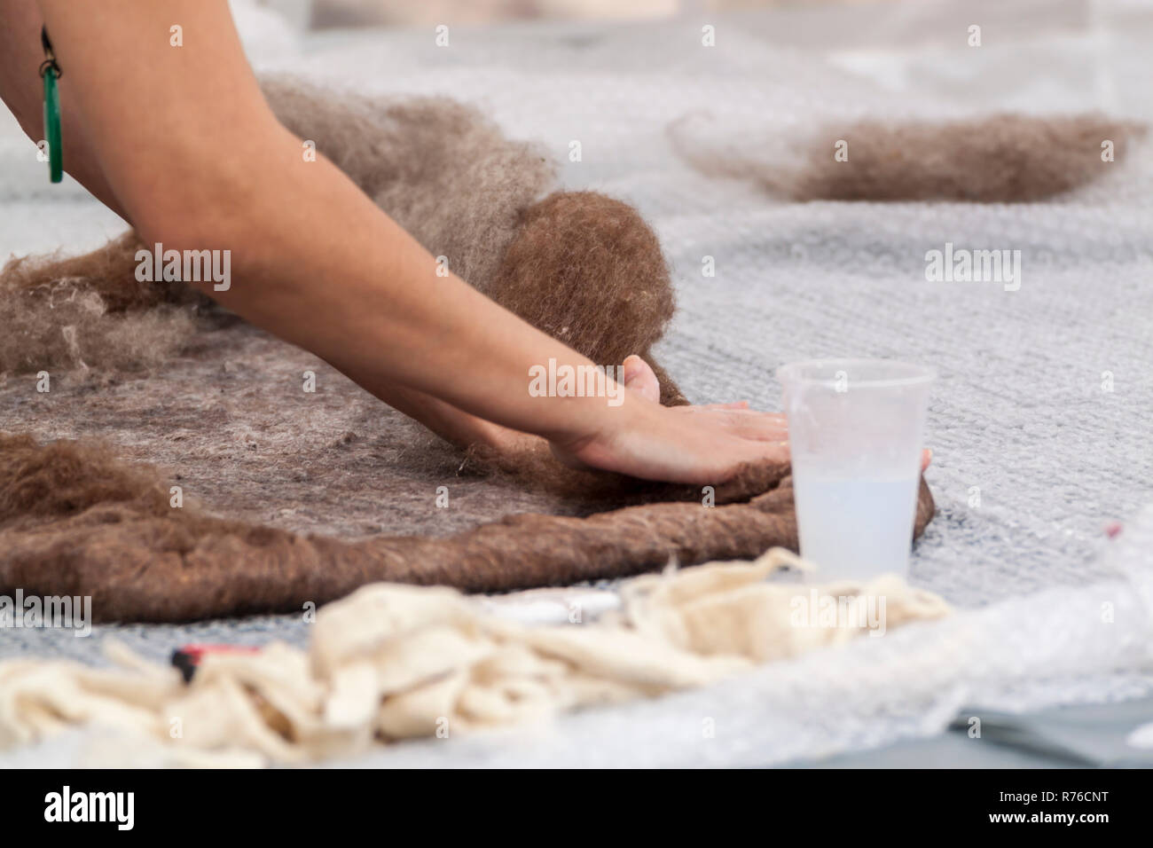 Old fashioned wool felting using only soap and water Stock Photo - Alamy